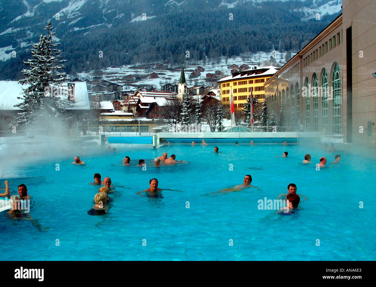 People bath in a medicinal hot water spring pool of Walliser ...