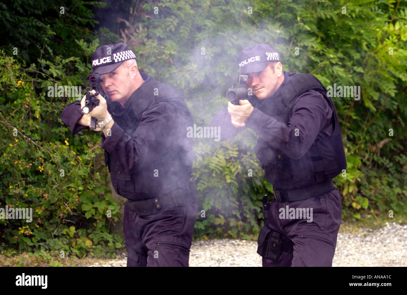 Officers from Humberside Police demonstrate the use of a baton gun to ...