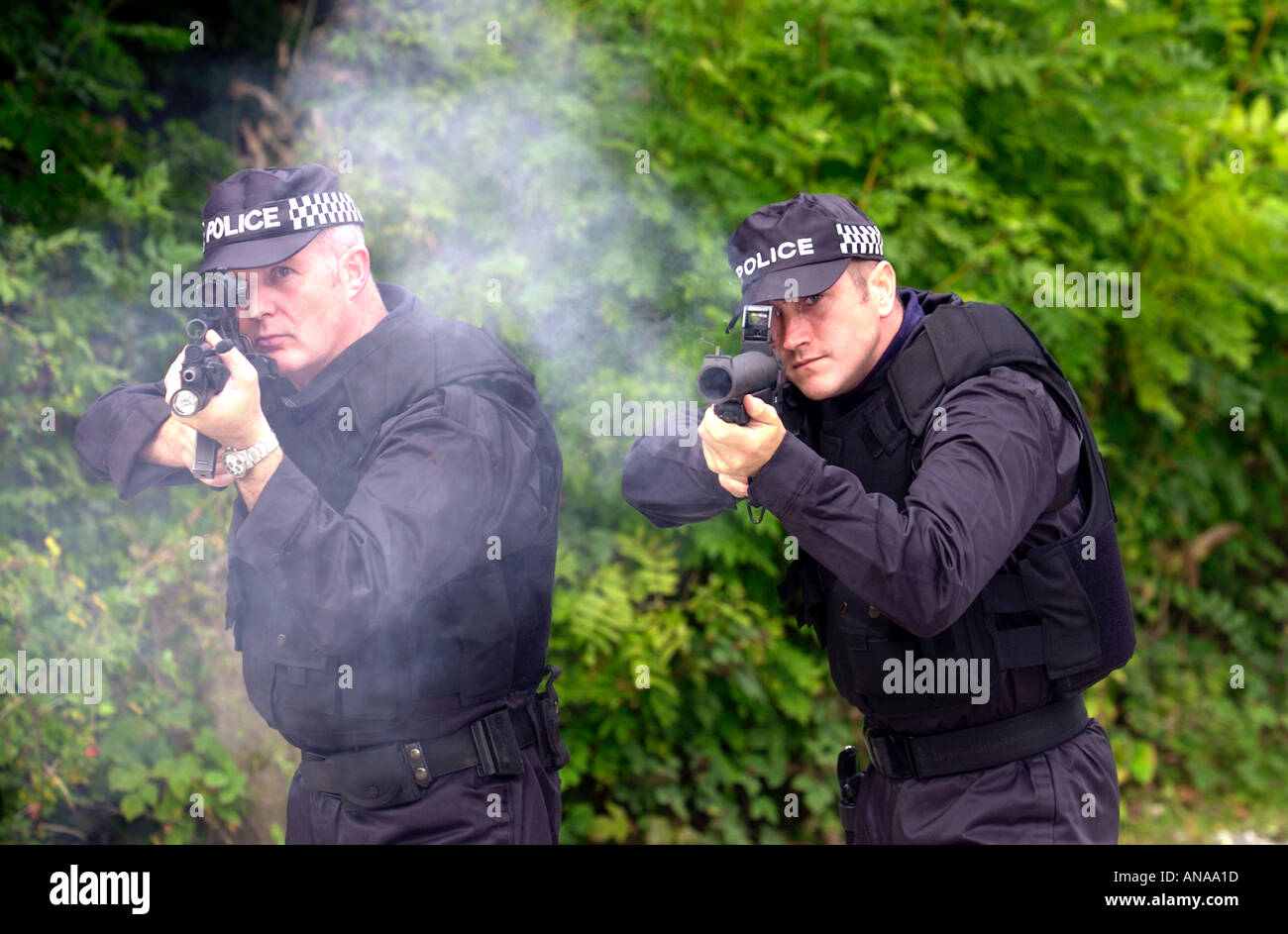 Officers from Humberside Police demonstrate the use of a baton gun to ...