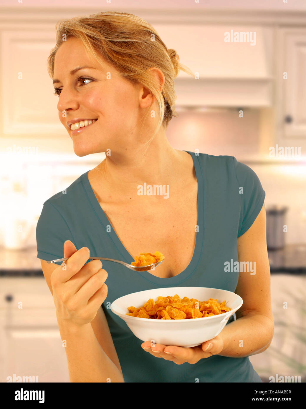 GIRL EATING BOWL OF CORNFLAKES Stock Photo - Alamy
