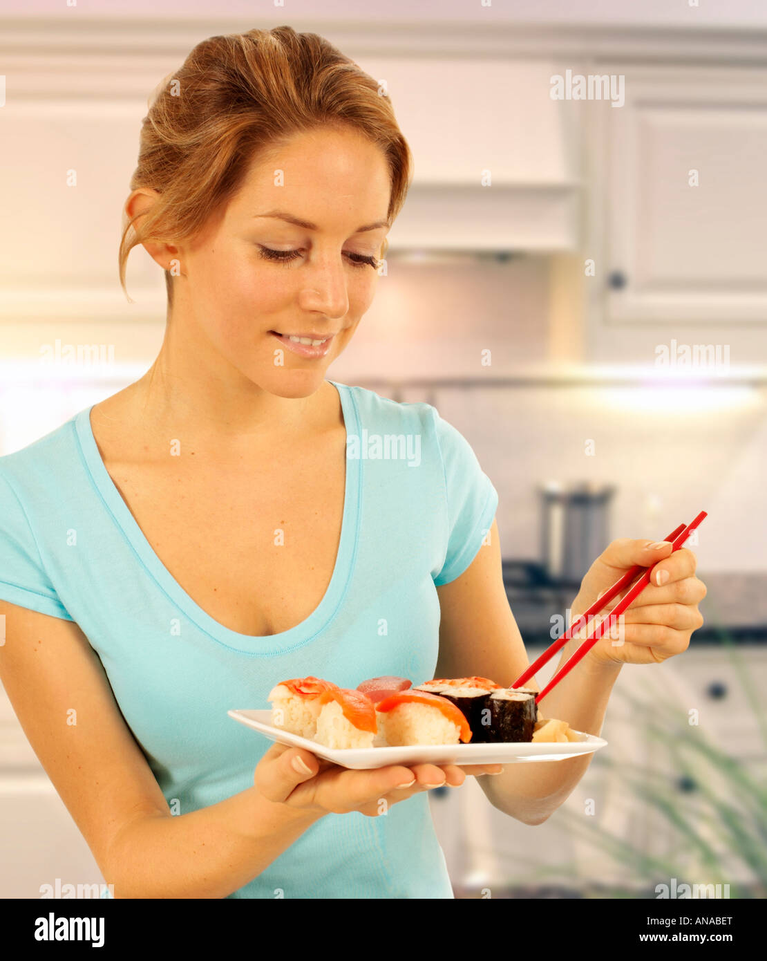 GIRL EATING SUSHI Stock Photo - Alamy