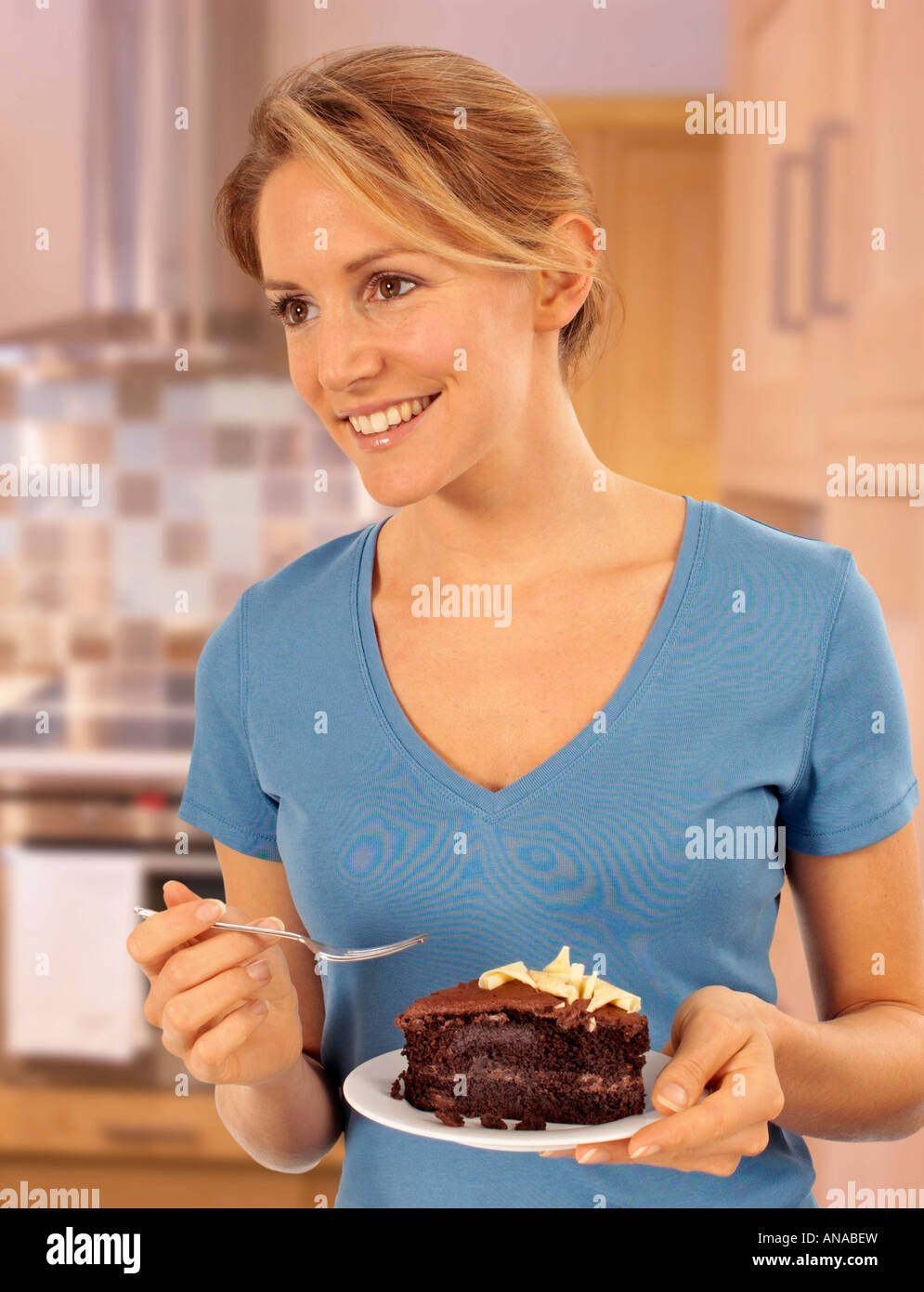 WOMAN EATING CHOCOLATE CAKE Stock Photo - Alamy