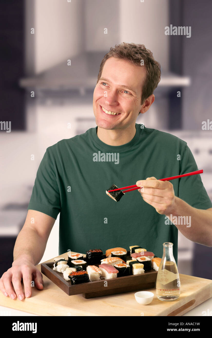 MAN EATING SUSHI Stock Photo - Alamy