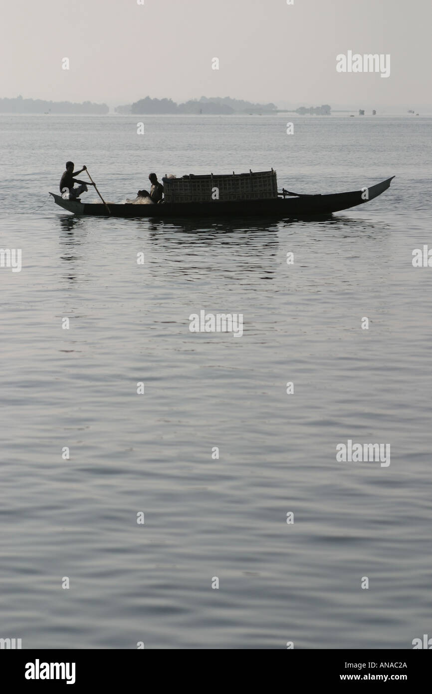 On kaptai lake fisherman inspects hi-res stock photography and images ...