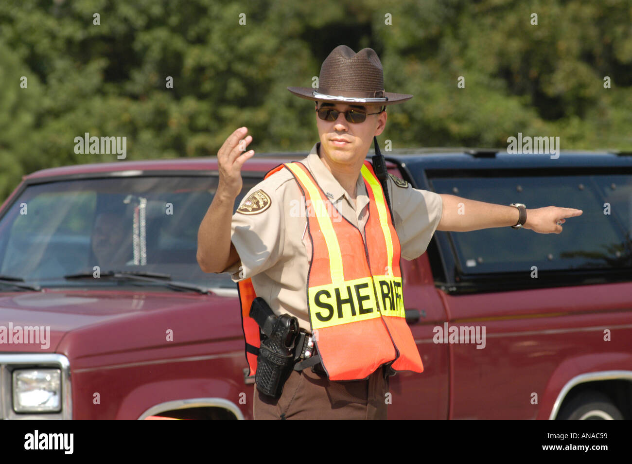 White southern Sheriff from Fulton County in Georgia directing traffic ...