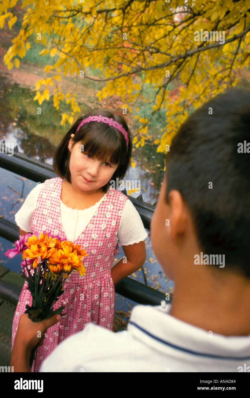 Girl getting flowers Stock Photo - Alamy