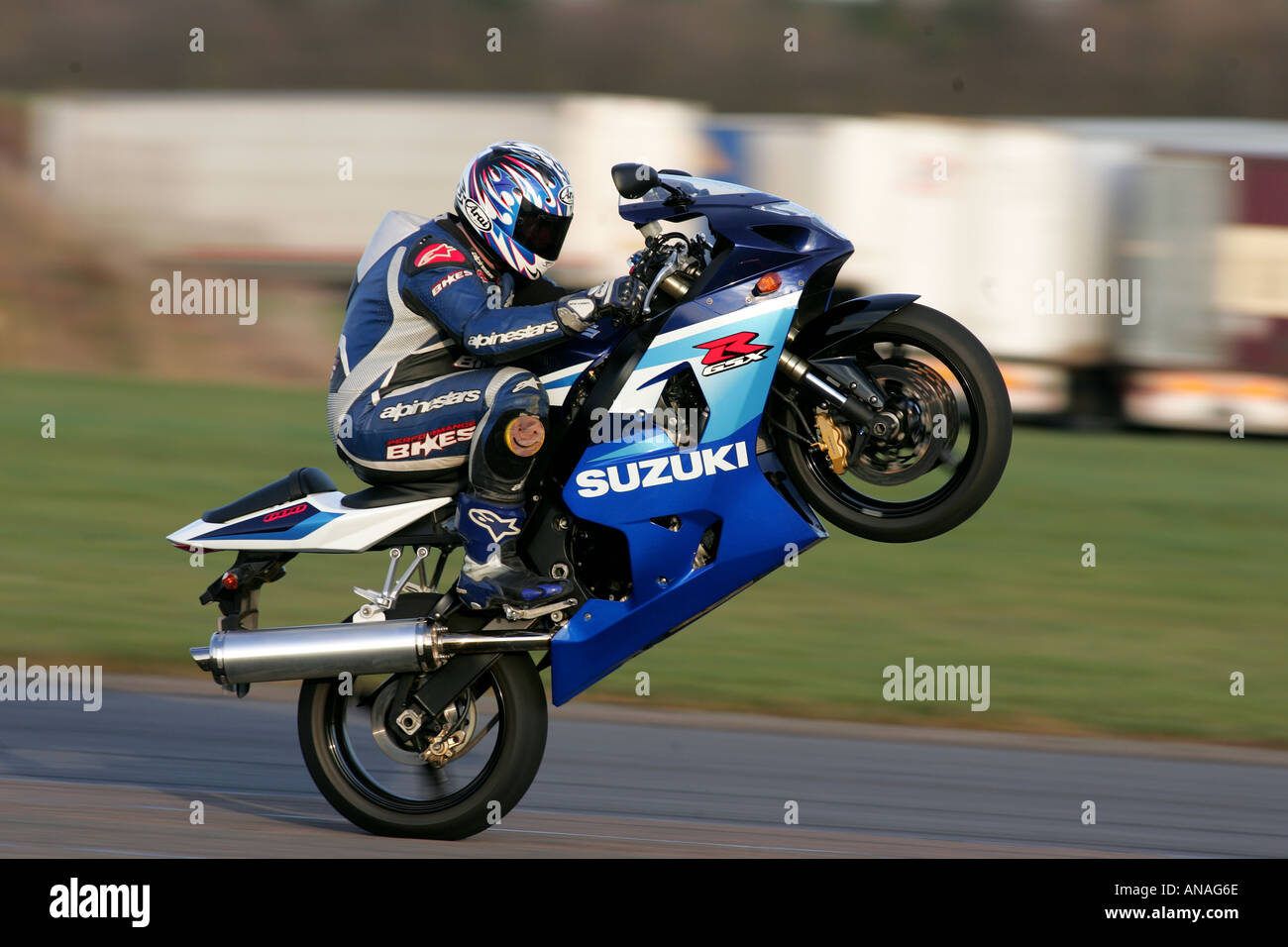 Motorcycles doing stunts including wheelies and jesus christs and ...