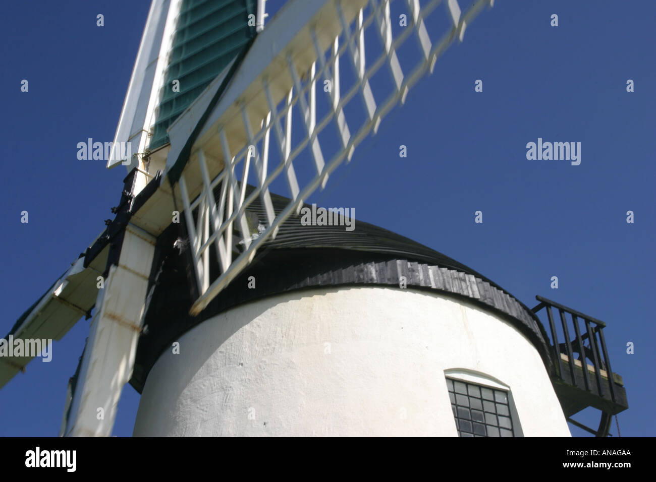 View of the windmill sails of the Melin Llynnon Mill in Anglesey, Wales ...
