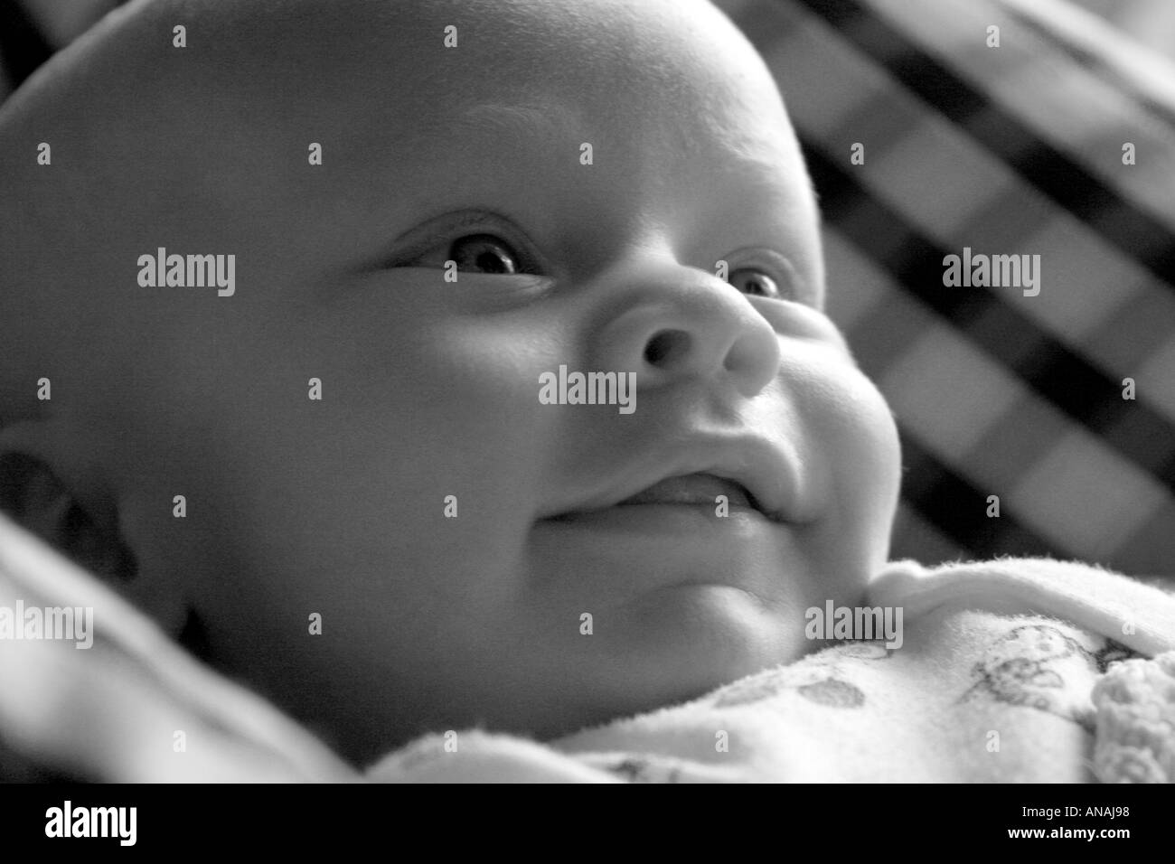 new born baby learning to smile Stock Photo - Alamy