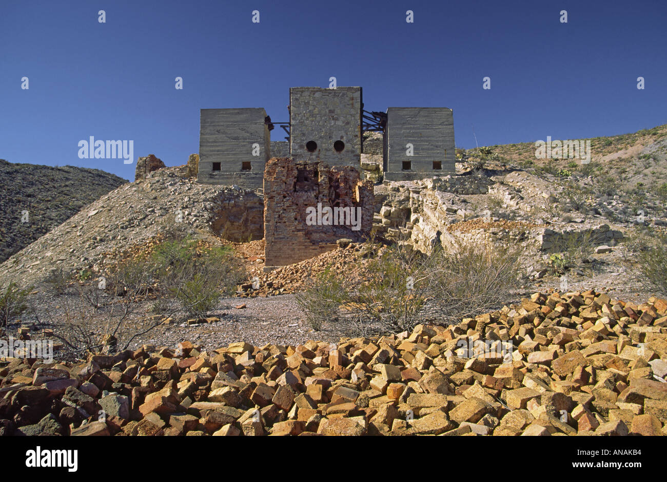 Three main condensers at Mariscal Mine ruins, calcite tailings in front ...