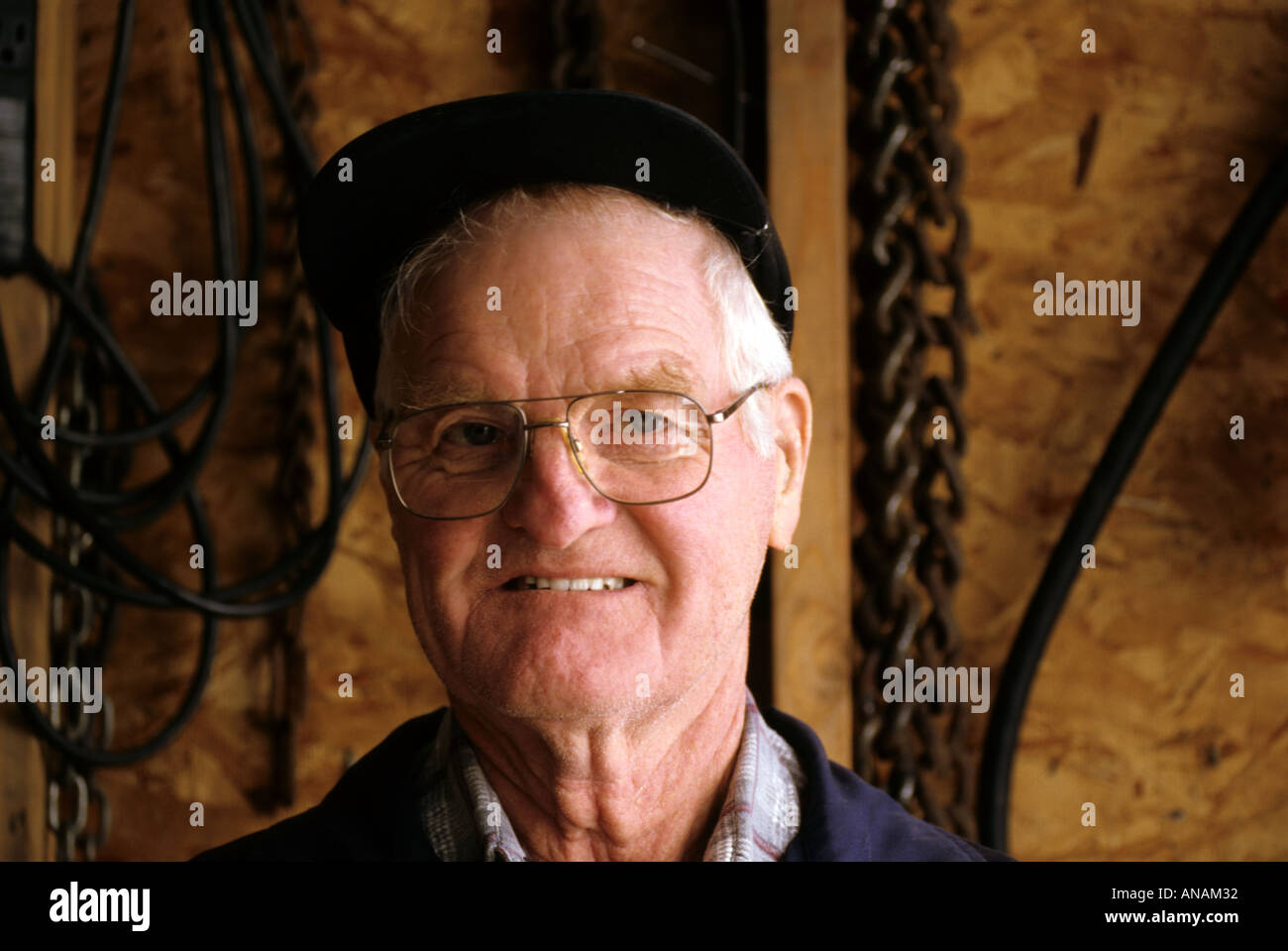 Man over retirement age still working portrait Stock Photo - Alamy