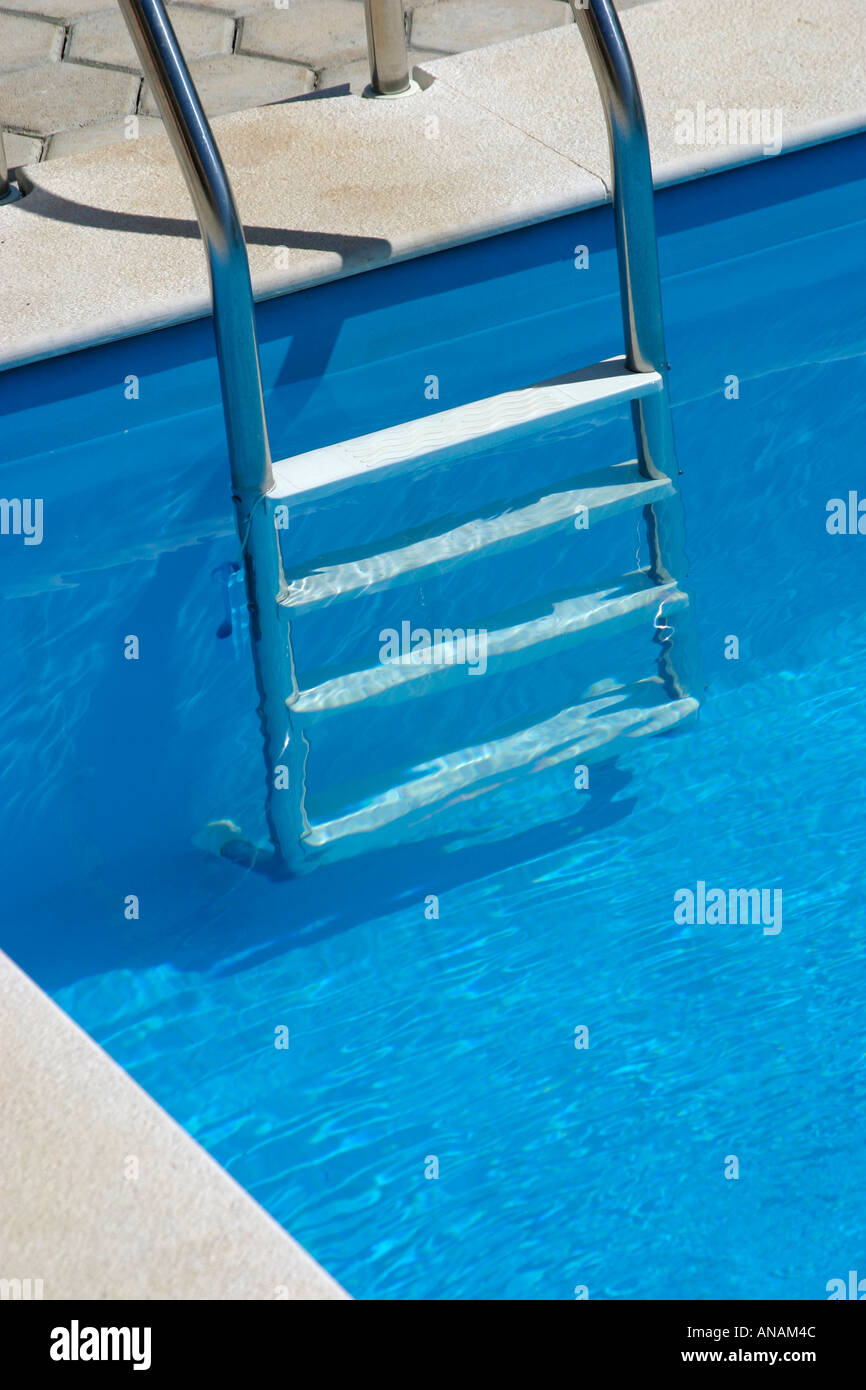 Steps to swimming pool Stock Photo - Alamy