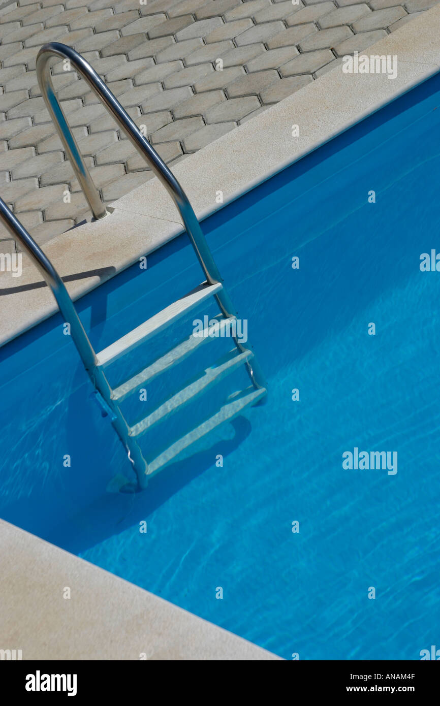 Steps to swimming pool Stock Photo - Alamy
