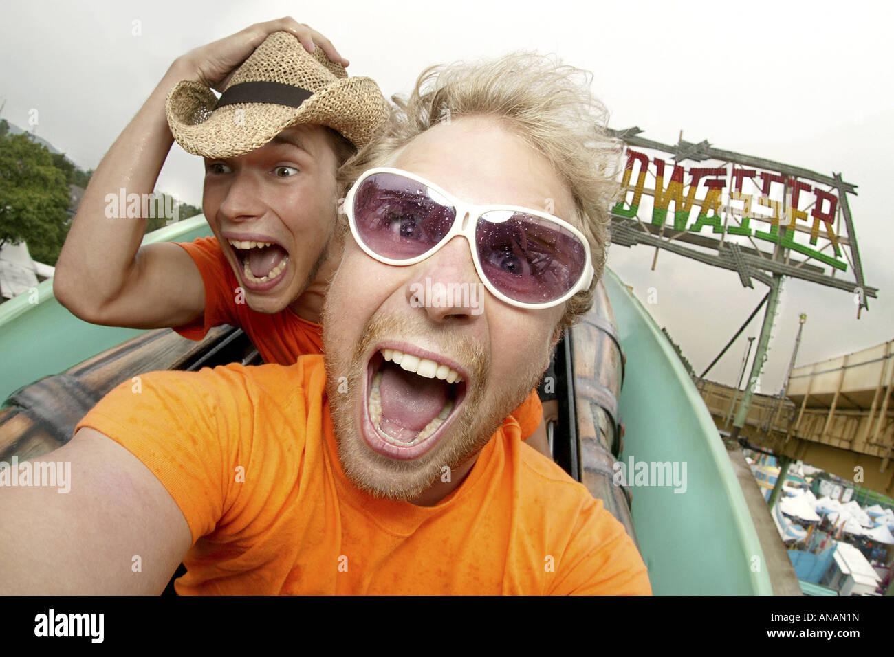 crazy young men on the Crange fun fair, Germany, North Rhine-Westphalia ...
