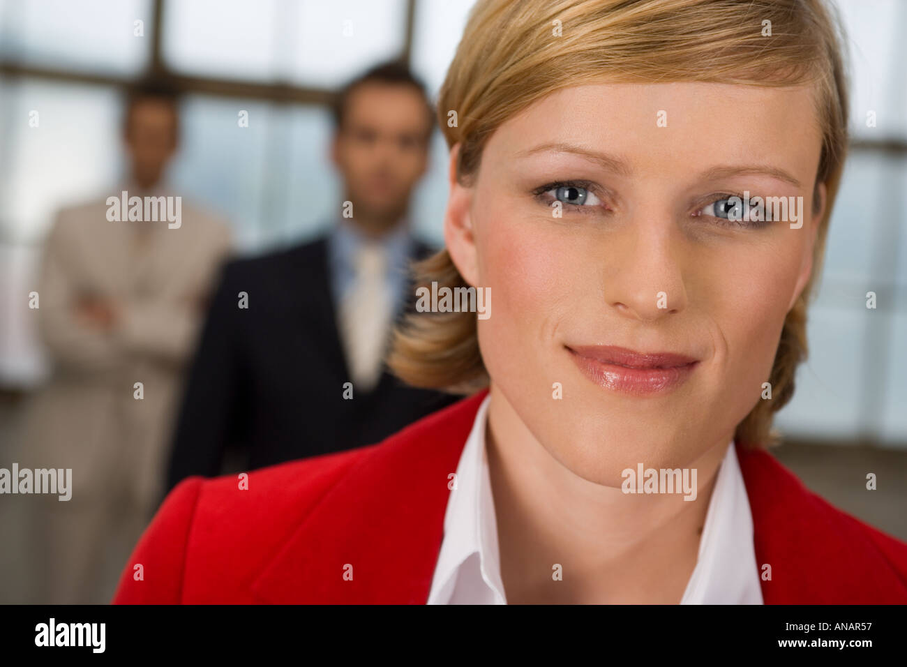 Person wearing red jacket hi-res stock photography and images - Alamy