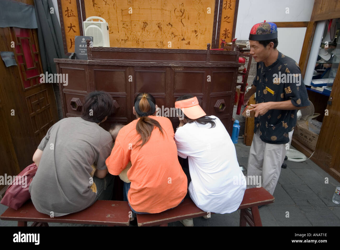 Old style Chinese peepshow in History Street Hangzhou China Stock Photo ...