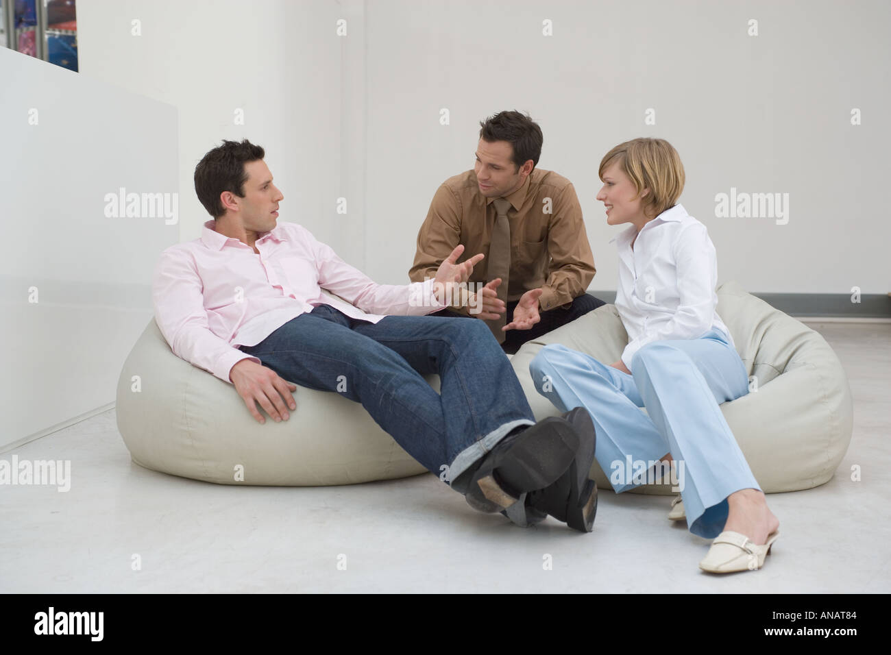 group of friends having a conversation Stock Photo - Alamy