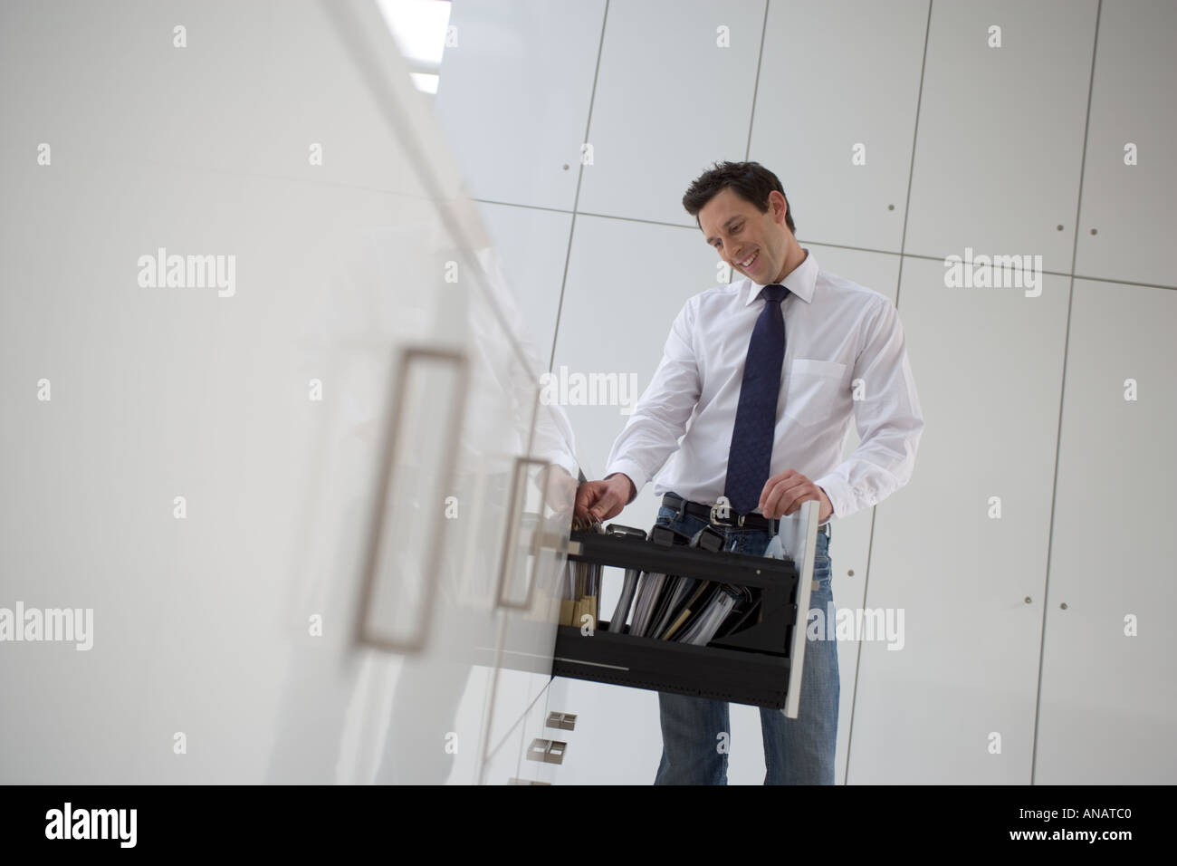 Searching through paper files hi-res stock photography and images - Alamy