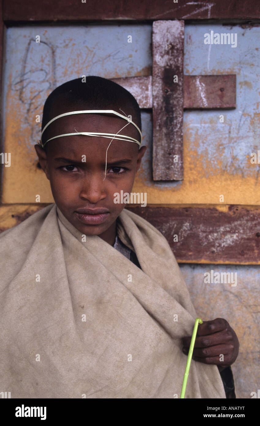 A young boy outside an orthodox christian coptic church The highlands ...