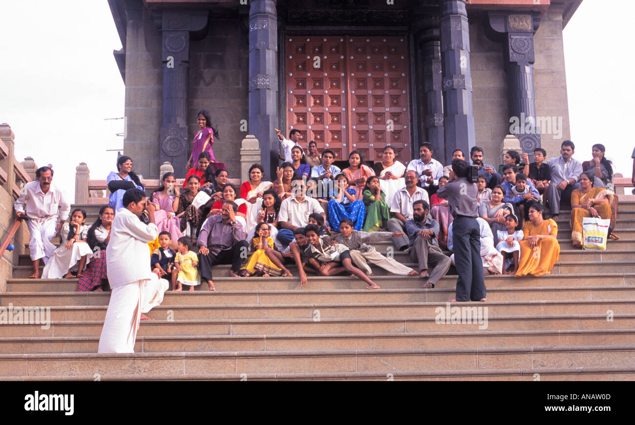Indian families in Sunday best visit the Hindu Vivekananda Memorial on ...