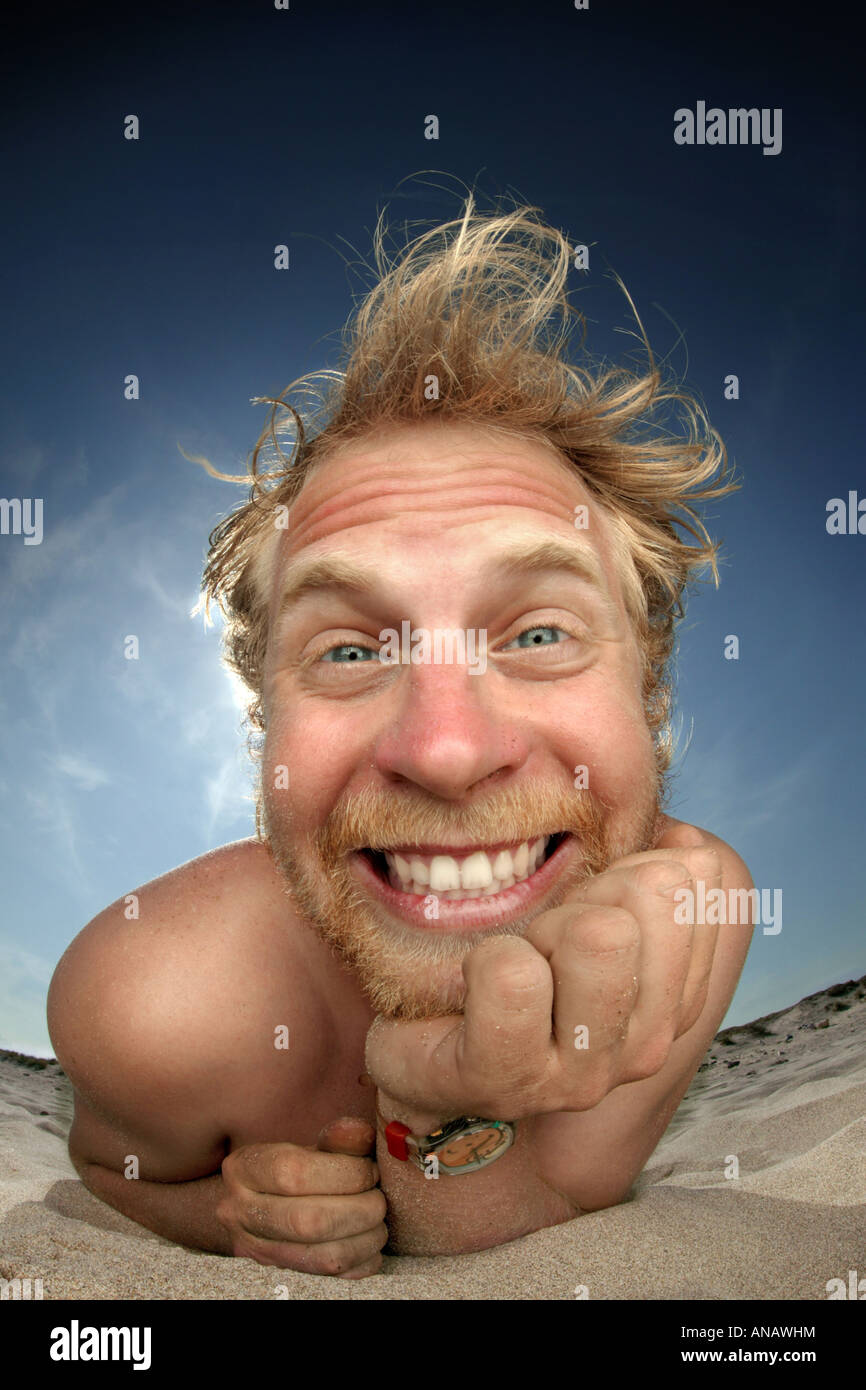 Crazy young man grinning camera hi-res stock photography and images - Alamy