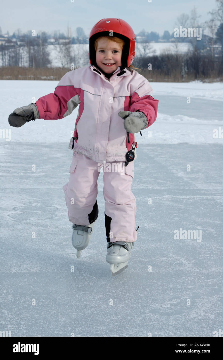 Child ice skating hi-res stock photography and images - Alamy