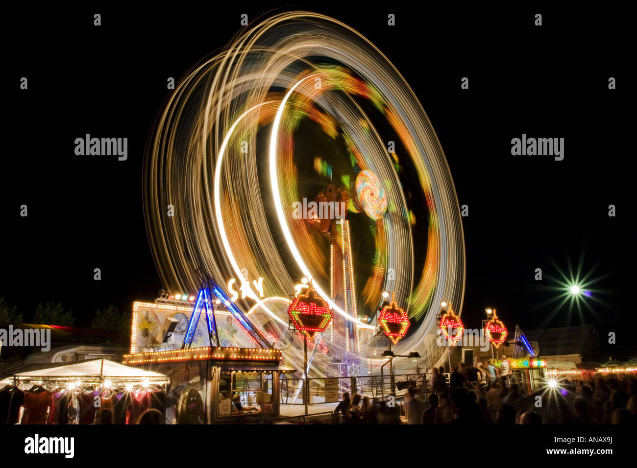 fun fair in the evening, fairground ride Sky Flyer, Germany, Baden ...