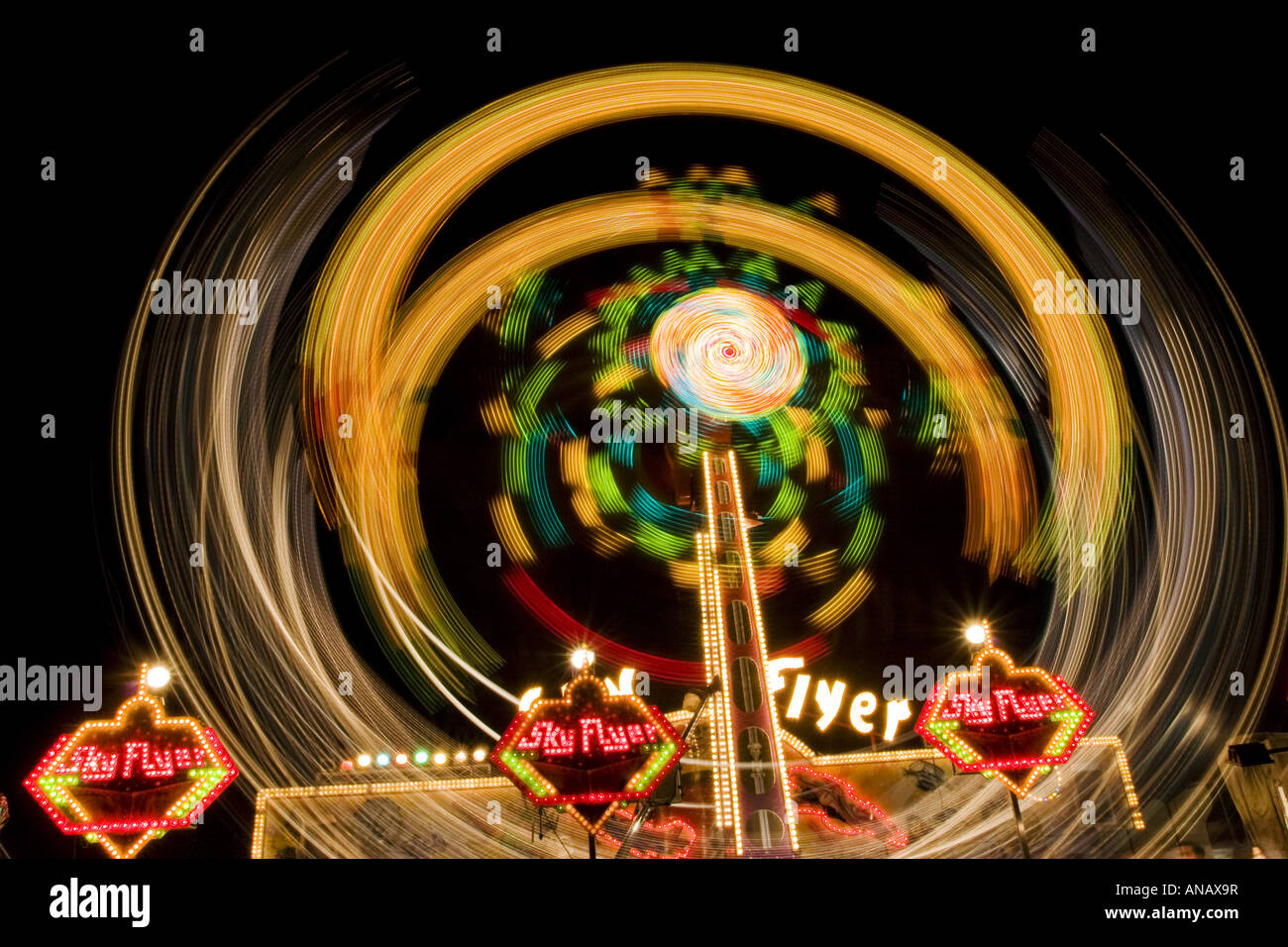 fun fair in the evening, fairground ride Sky Flyer, Germany, Baden ...