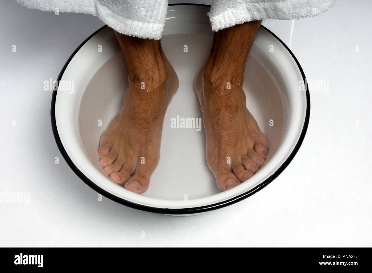 Man washing his feet hi-res stock photography and images - Alamy