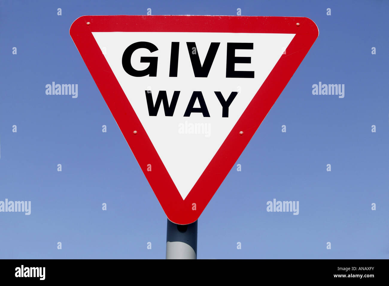 Give Way sign Stock Photo - Alamy