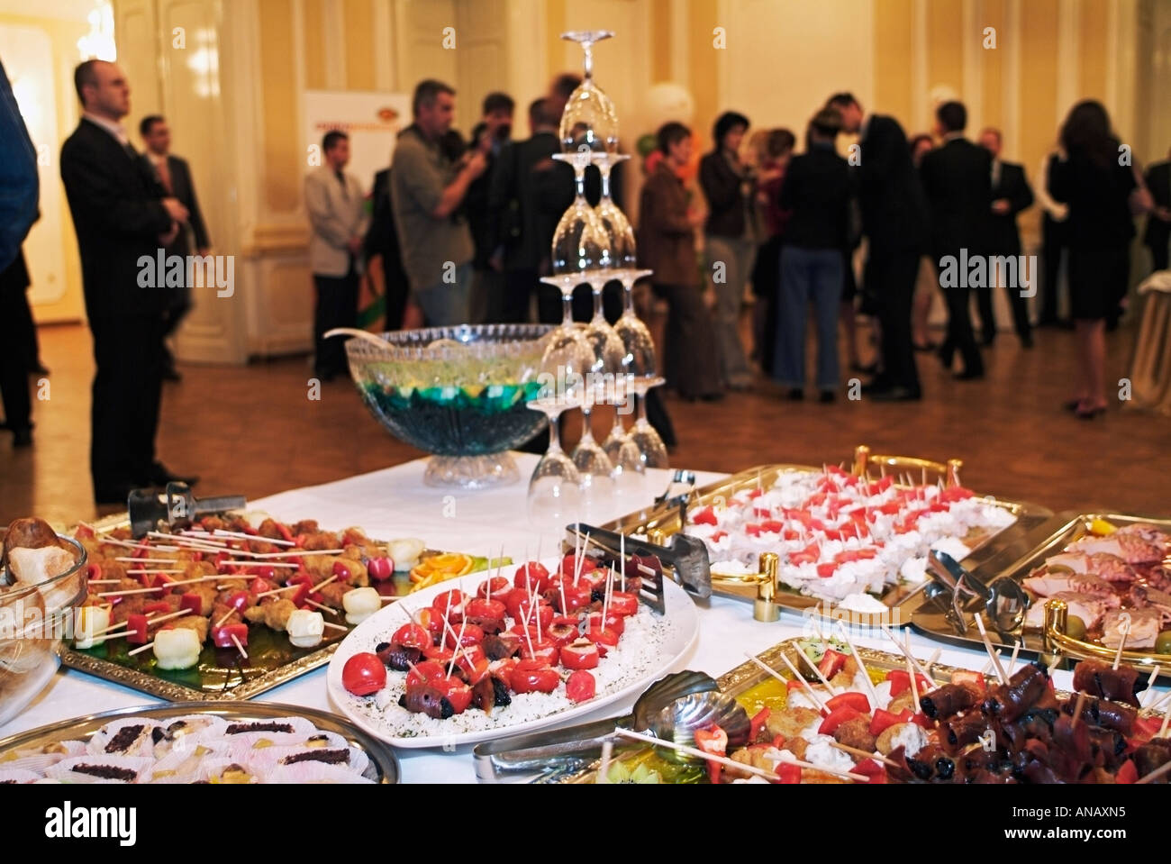 Buffet Table at a Business Conference with People Mingling in the ...