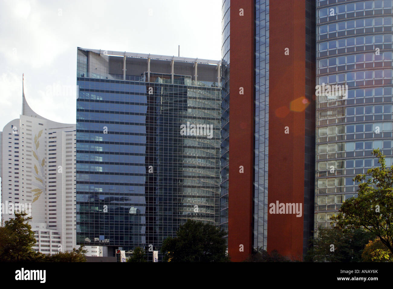 Reflections in mirrored facade in a modern building hi-res stock ...