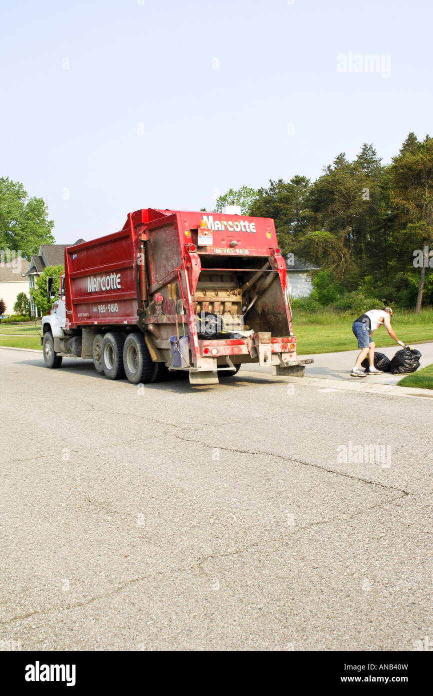 Local Neighbourhood rubbish collection workers pick up household trash ...