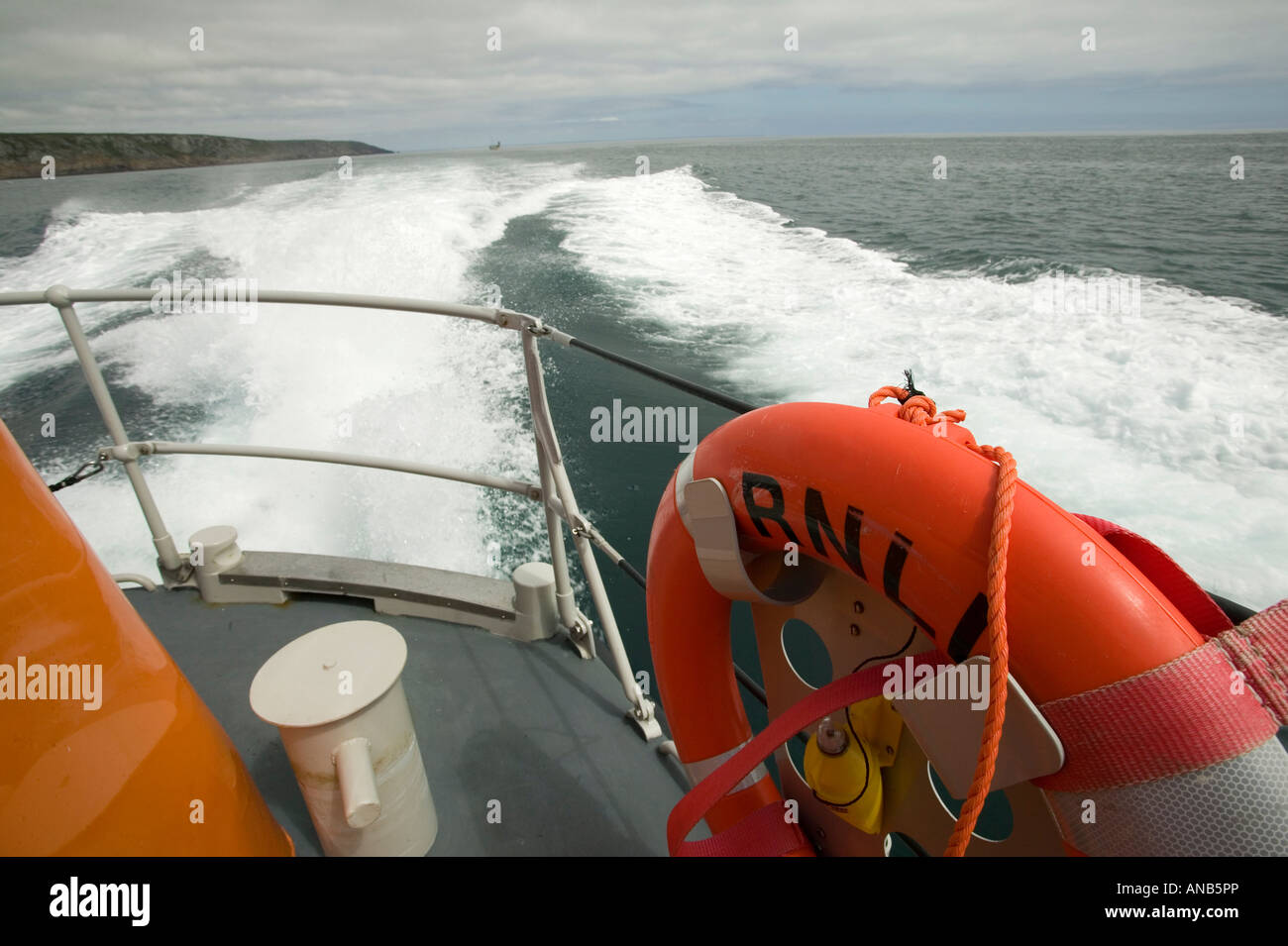The Sennen lifeboat makes its way along the North Cornwall coast Stock ...