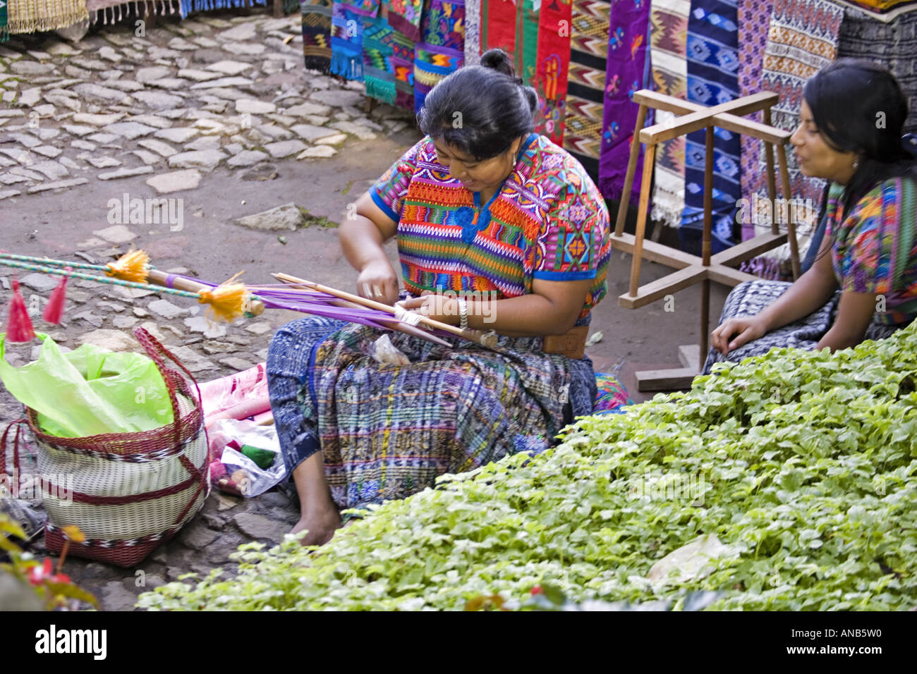 GUATEMALA ANTIGUA Cakchiquel Mayan woman wearing traditional huipil and ...