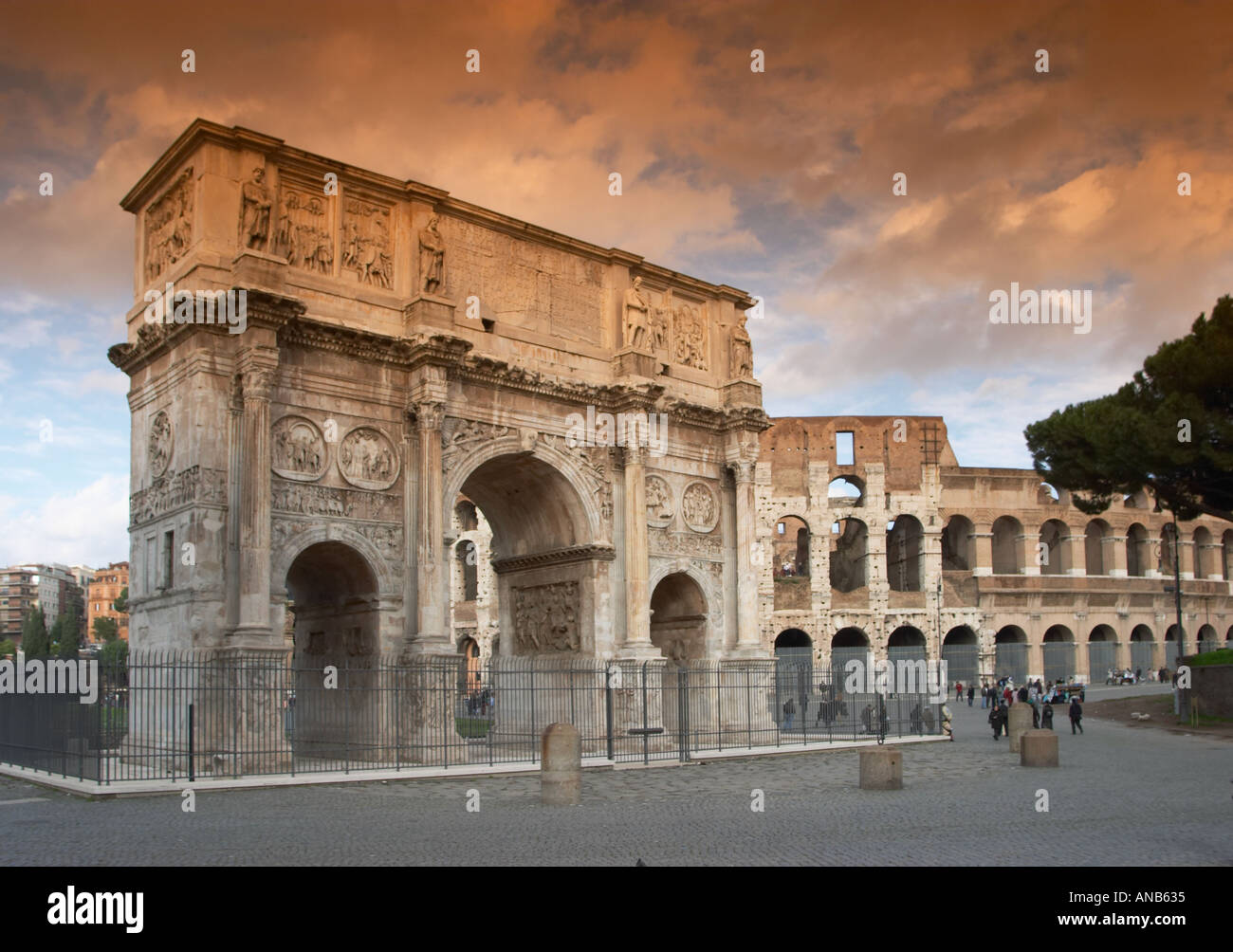 Arco di Constantino (Arch of Constanttine) with the Colosseum in the ...