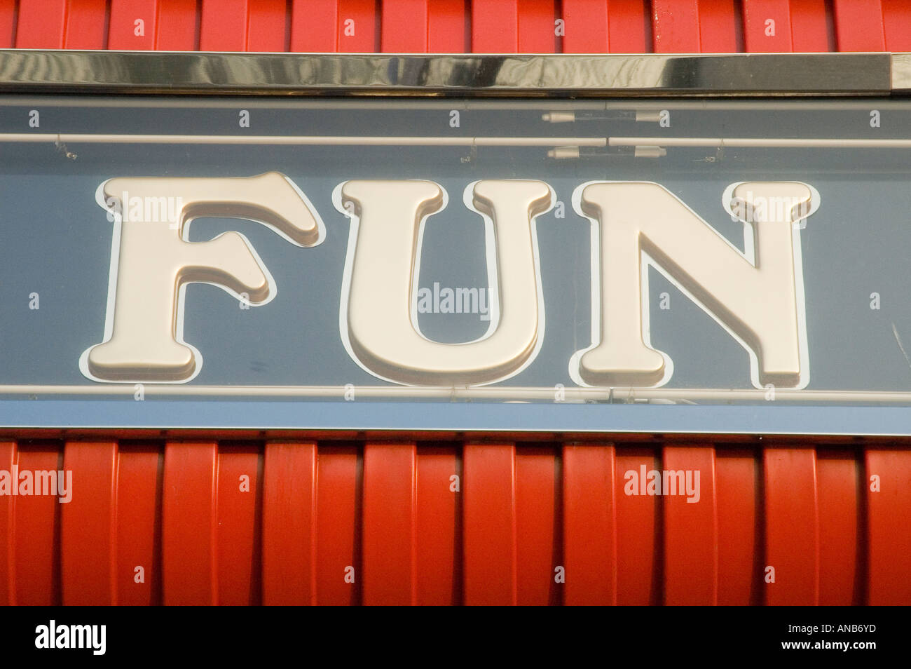 Fun sign outside amusement arcade Whitby North Yorkshire Stock Photo ...