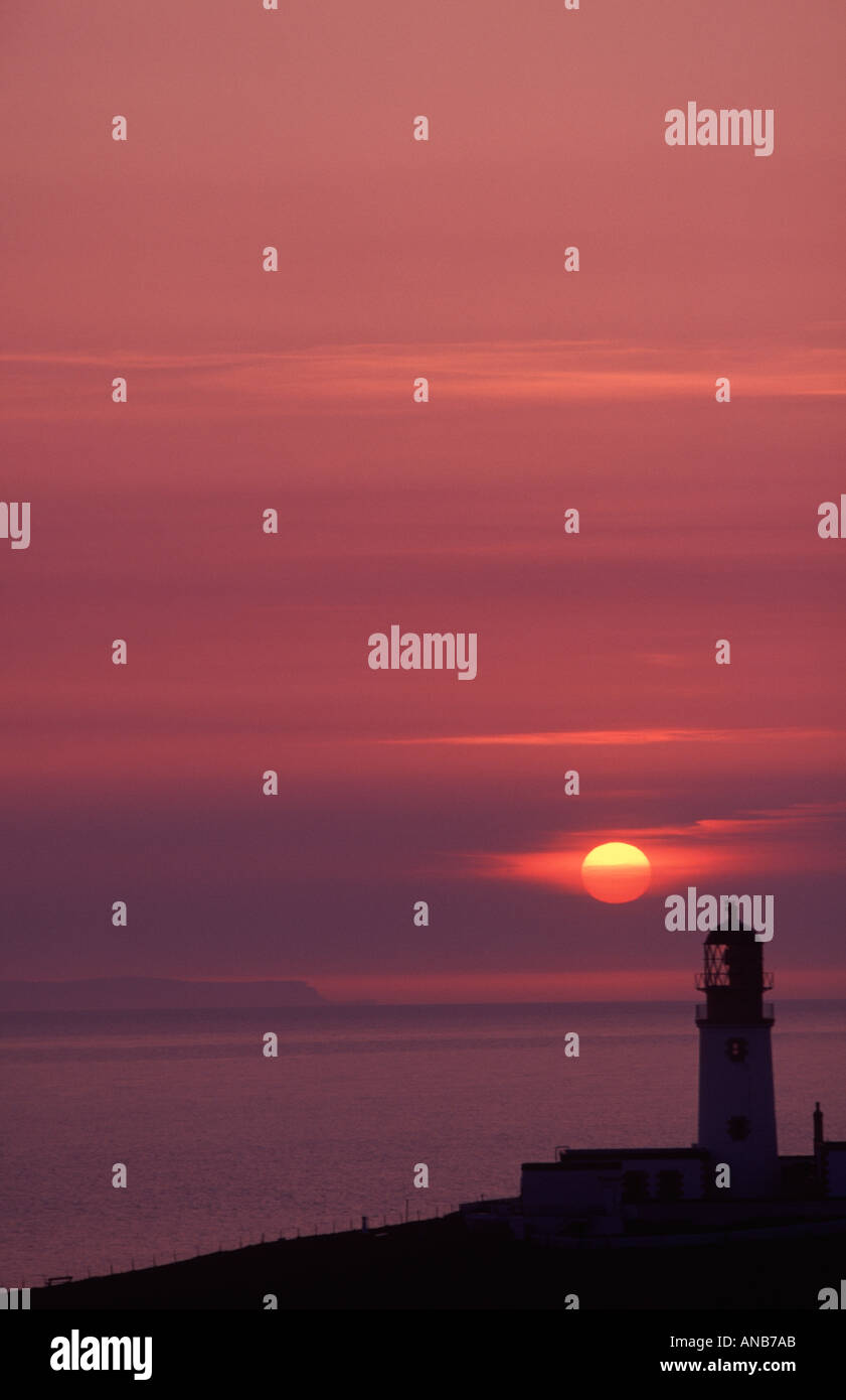 Sun sinking into the sea Killantringan Lighthouse just north of ...