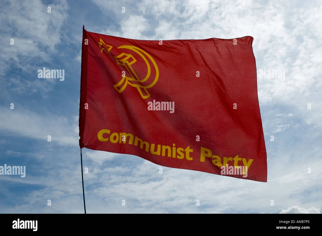 A red Communist Party flag Stock Photo - Alamy