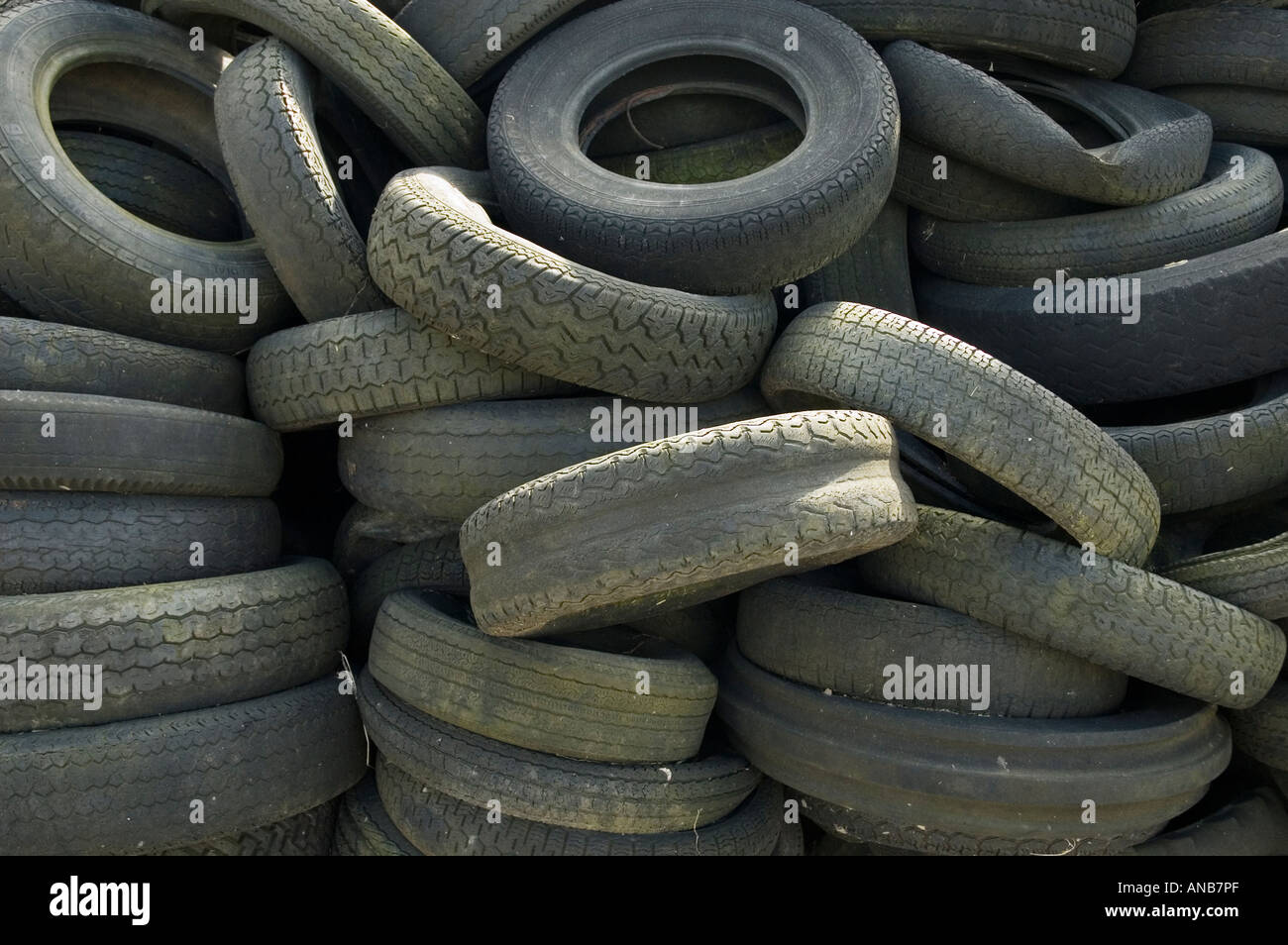 Pile of discarded tyres Stock Photo - Alamy