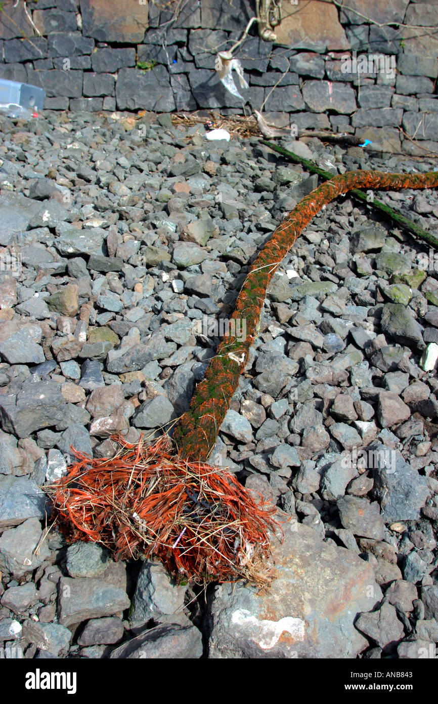 Old rope washed up on beach Stock Photo - Alamy
