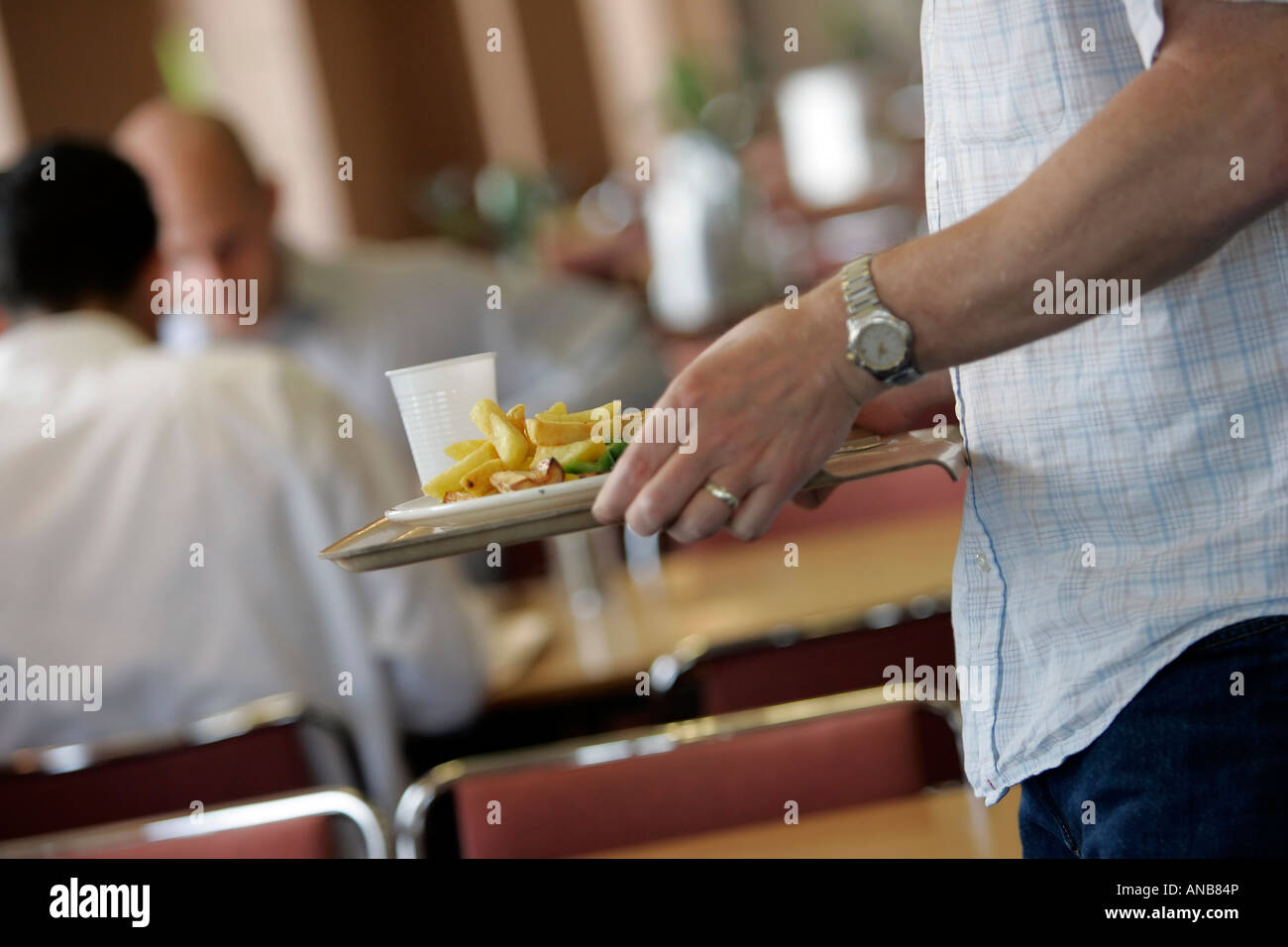 MALE OFFICE WORKER WITH LUNCH TRAY IN AN OFFICE CANTEEN Stock Photo - Alamy