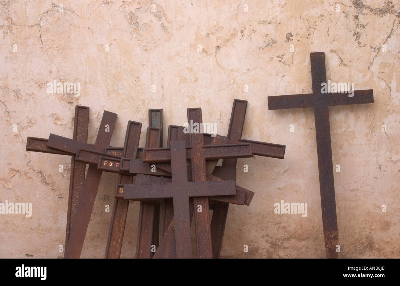 Rusty, rusting steel crosses in cemetery Stock Photo - Alamy