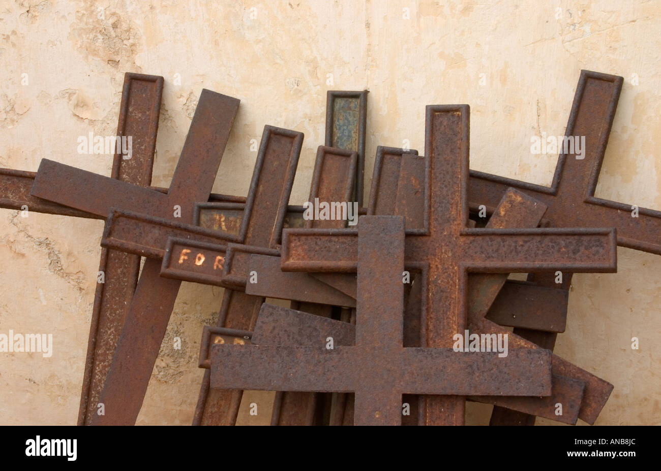 Rusty, rusting steel crosses in cemetery Stock Photo - Alamy