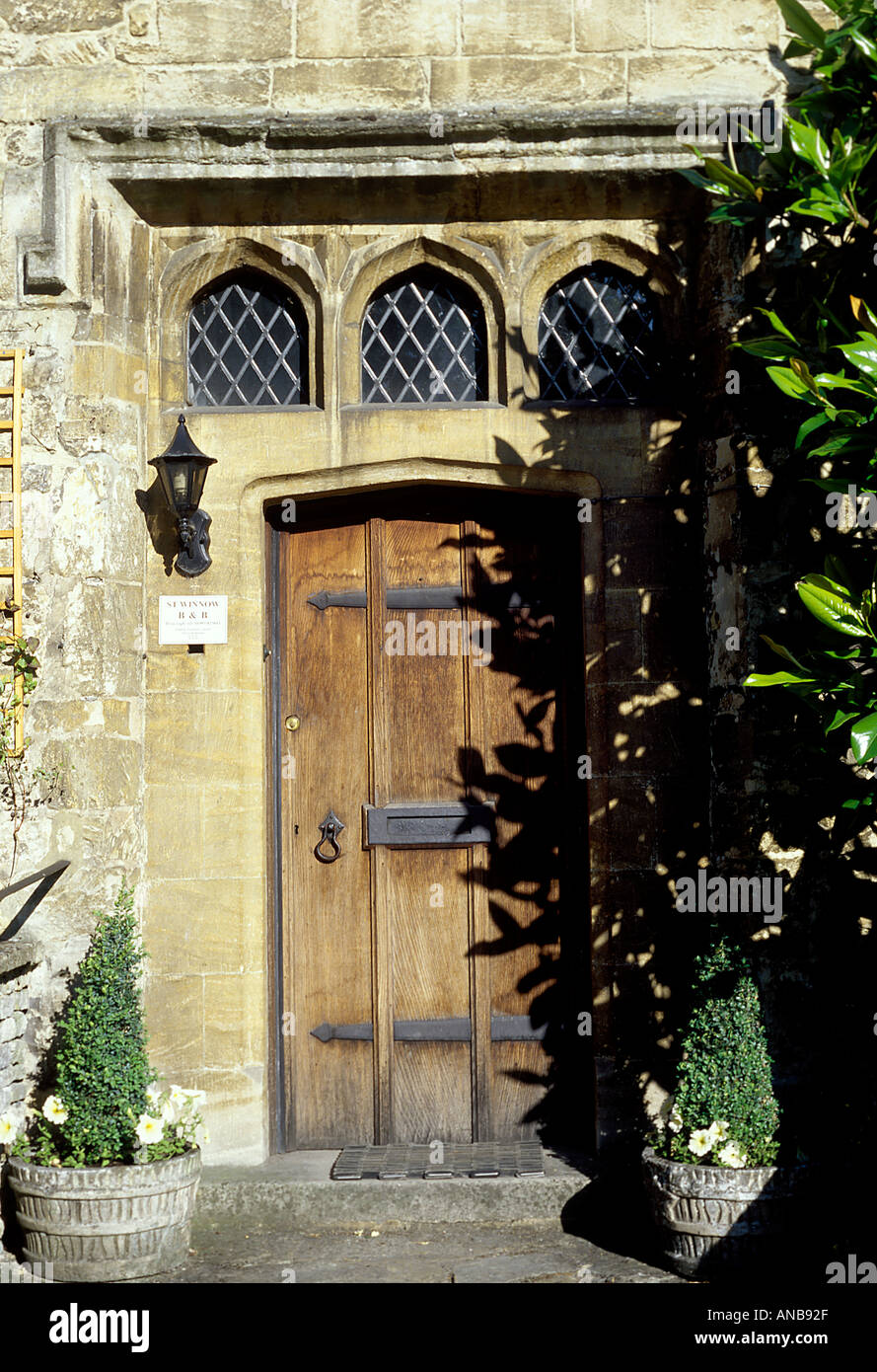 Doorway in the gothic style with gothic three light transom Burford ...
