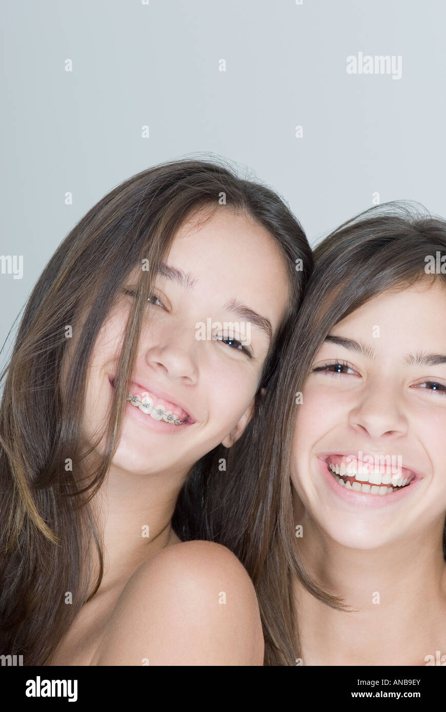 Two Hispanic teenage girls smiling Stock Photo - Alamy