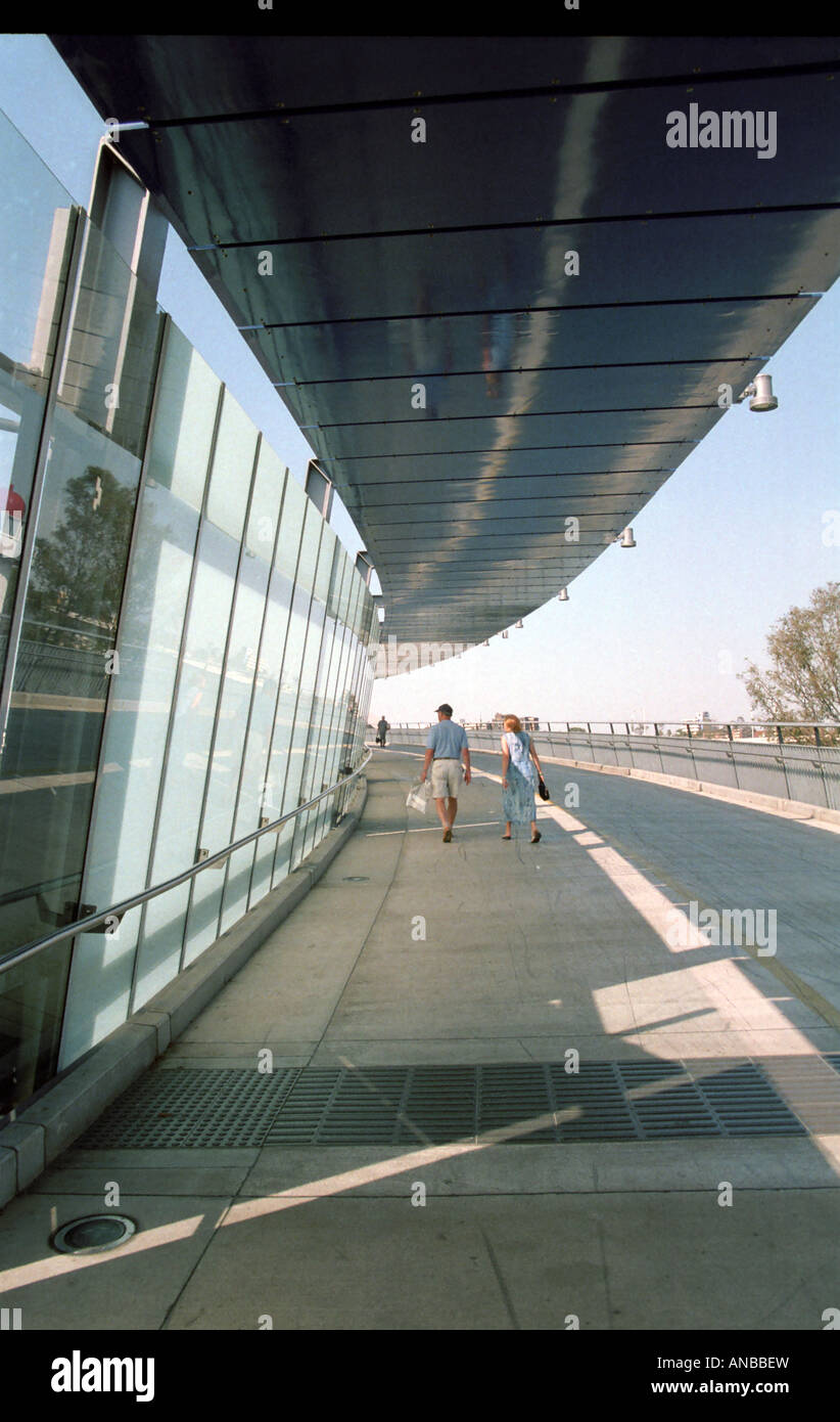 Couple walking, Goodwill Bridge over Brisbane River, Brisbane ...