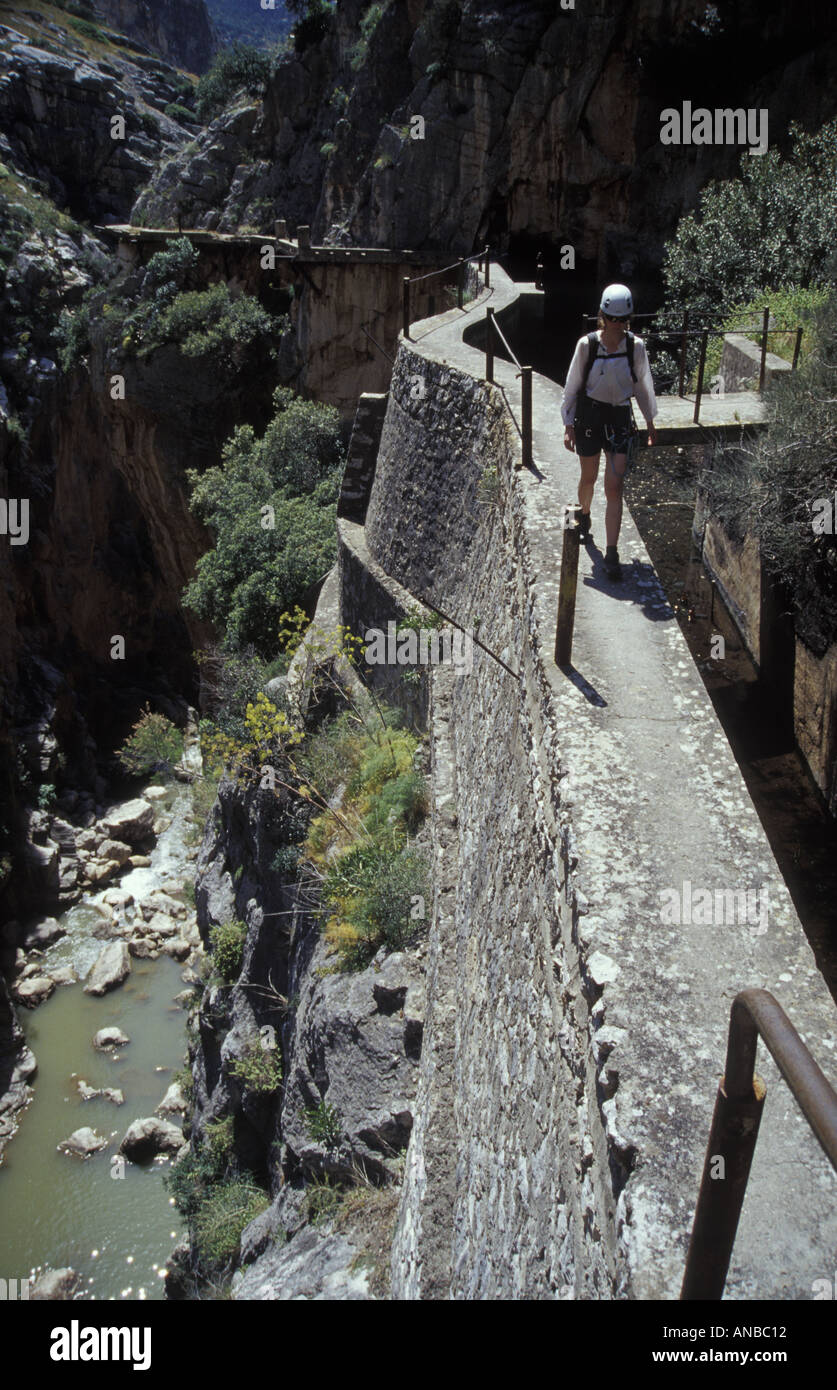 Climber walking along the Camino del Rey El Chorro Gorge Andalucia ...