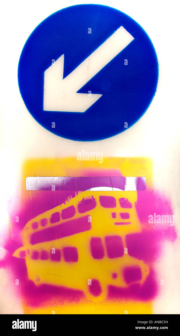 Detail of graffiti on an English road sign Arrow and a double decker ...