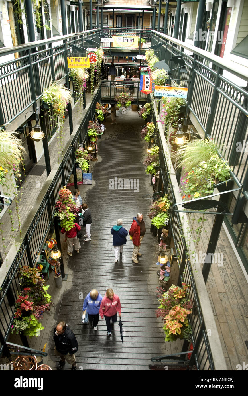 People walk through a mall in Province Town Stock Photo - Alamy
